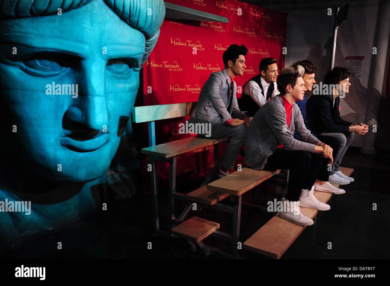 New York, NY. 18th July, 2013. One Direction Wax Figures inside for ...