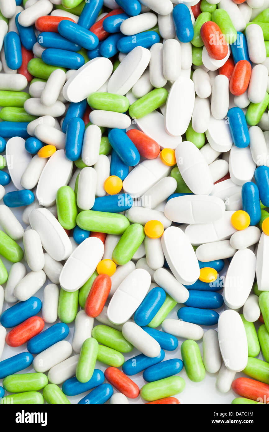 Big pile of drugs, many different pills and tablets of different color ...