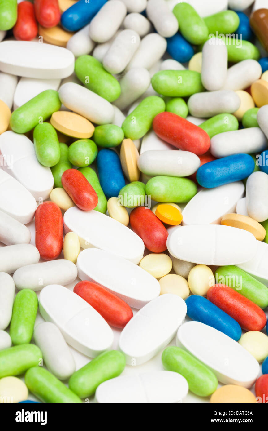Big groups of many different pills and tablets drugs of different ...