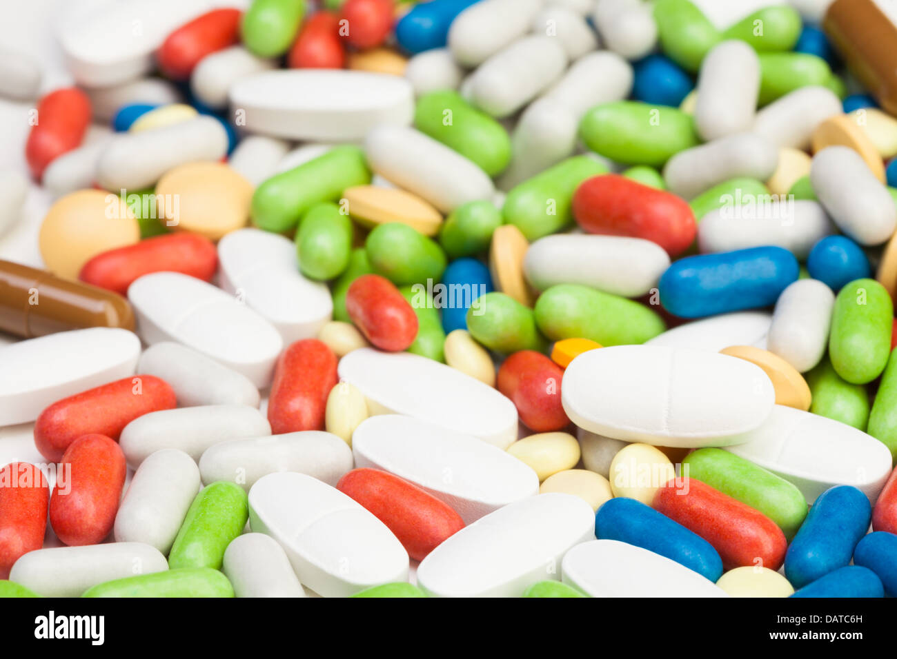 Huge pile of many different pills and tablets of different colors Stock ...