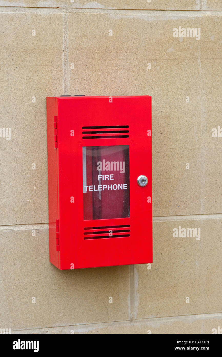 Fire Telephone in red case on outside of Council building Stock Photo ...