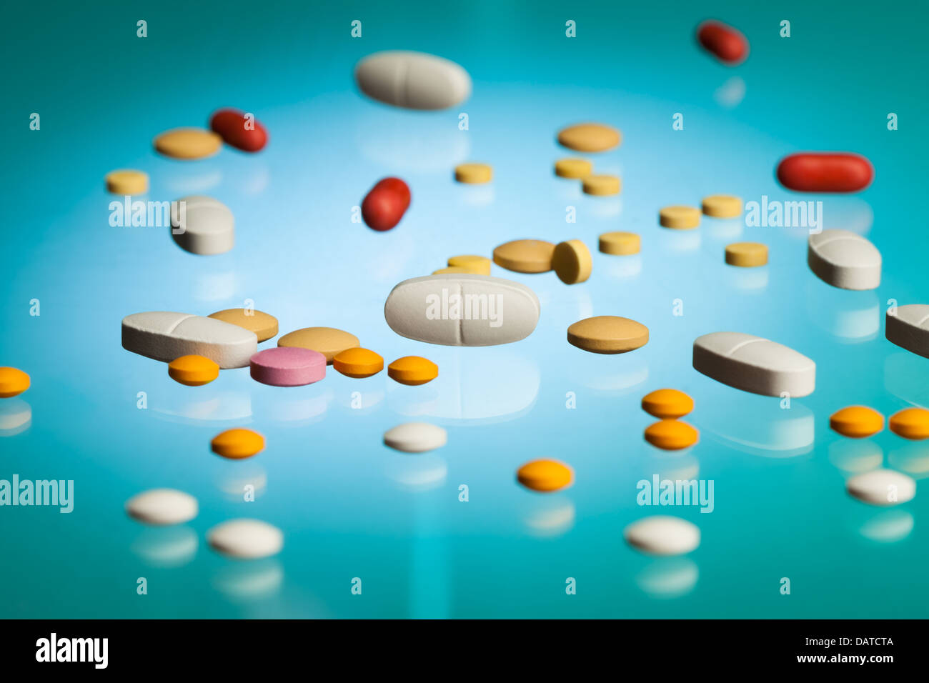 Many different drugs, pills and tablets of different shapes and form on ...