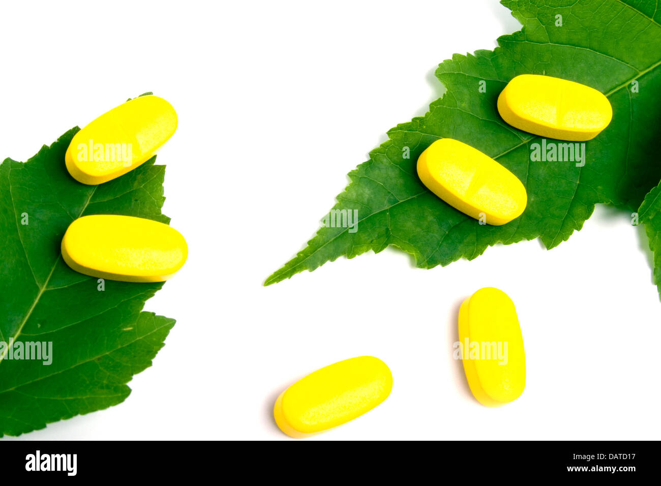 Pill capsule green leaves hi-res stock photography and images - Alamy