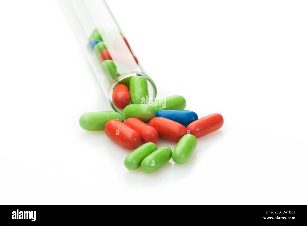 Different color drugs in pills scattered from the tets tube Stock Photo ...