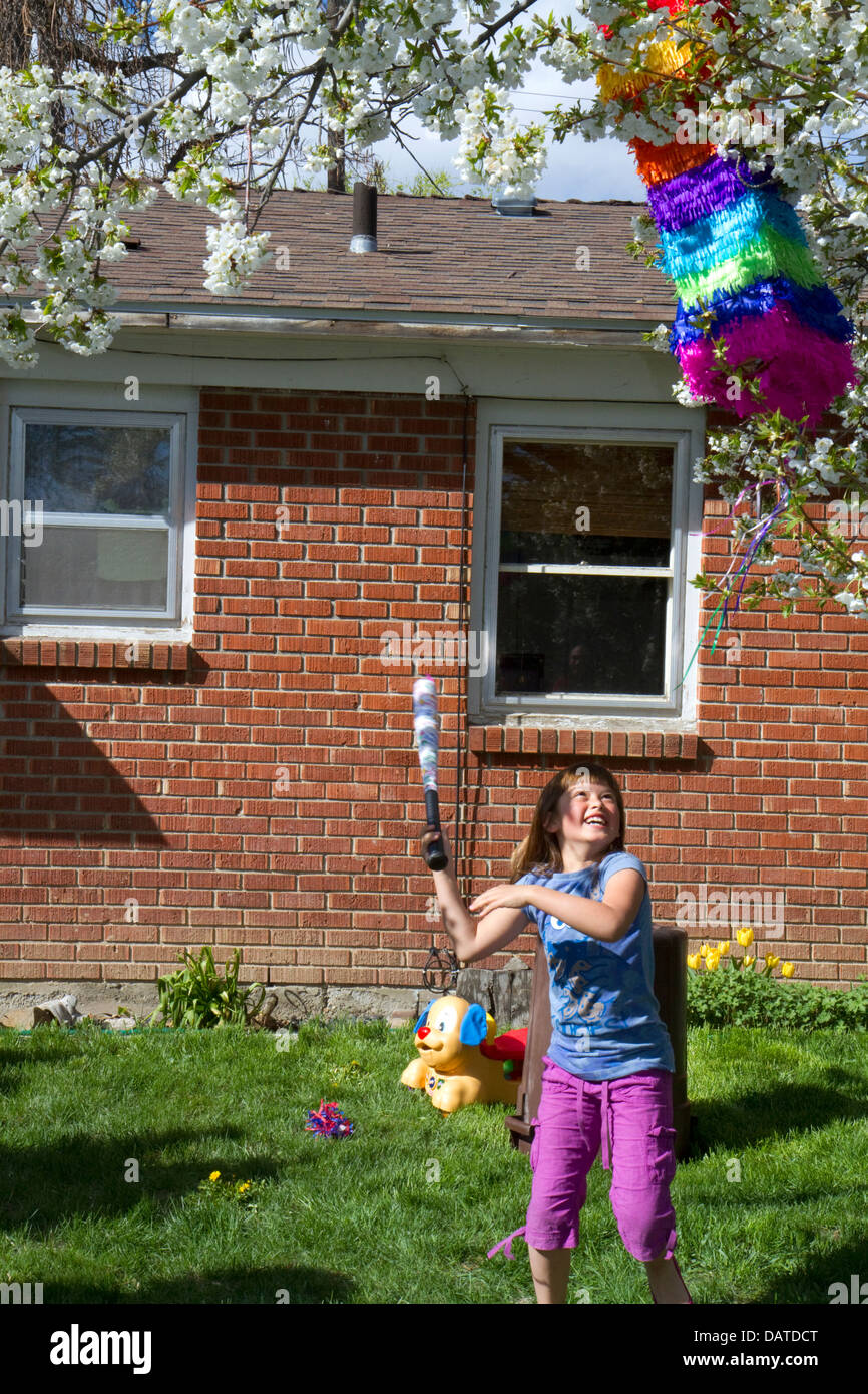 Mexican kids hitting a pinata hi-res stock photography and images - Alamy