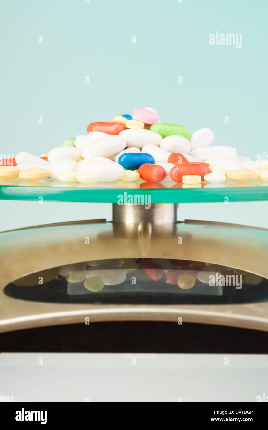 Close-up of scale with precious drugs on weights Stock Photo - Alamy