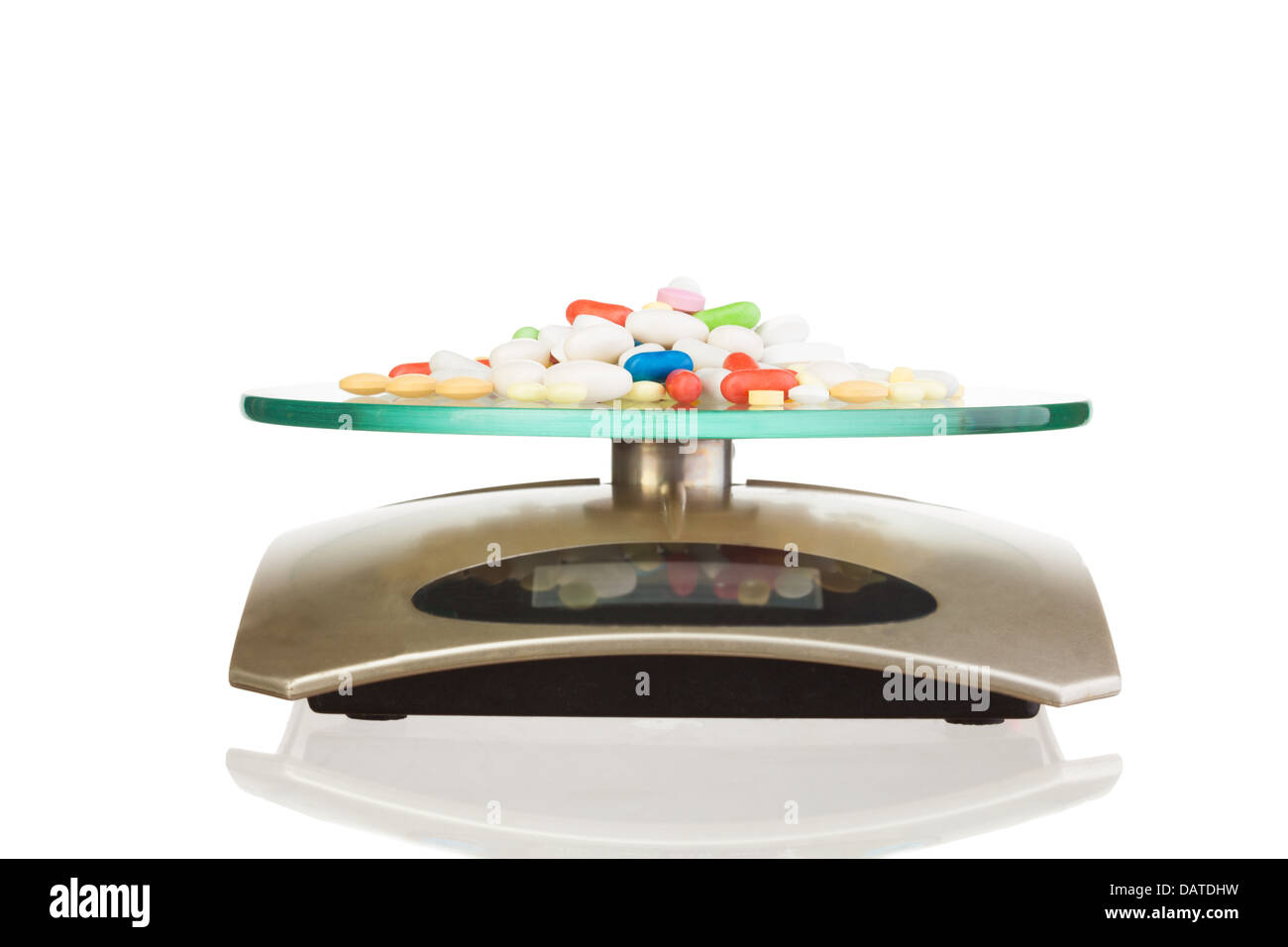 Scale with precious drugs on weights, isolated on white Stock Photo - Alamy