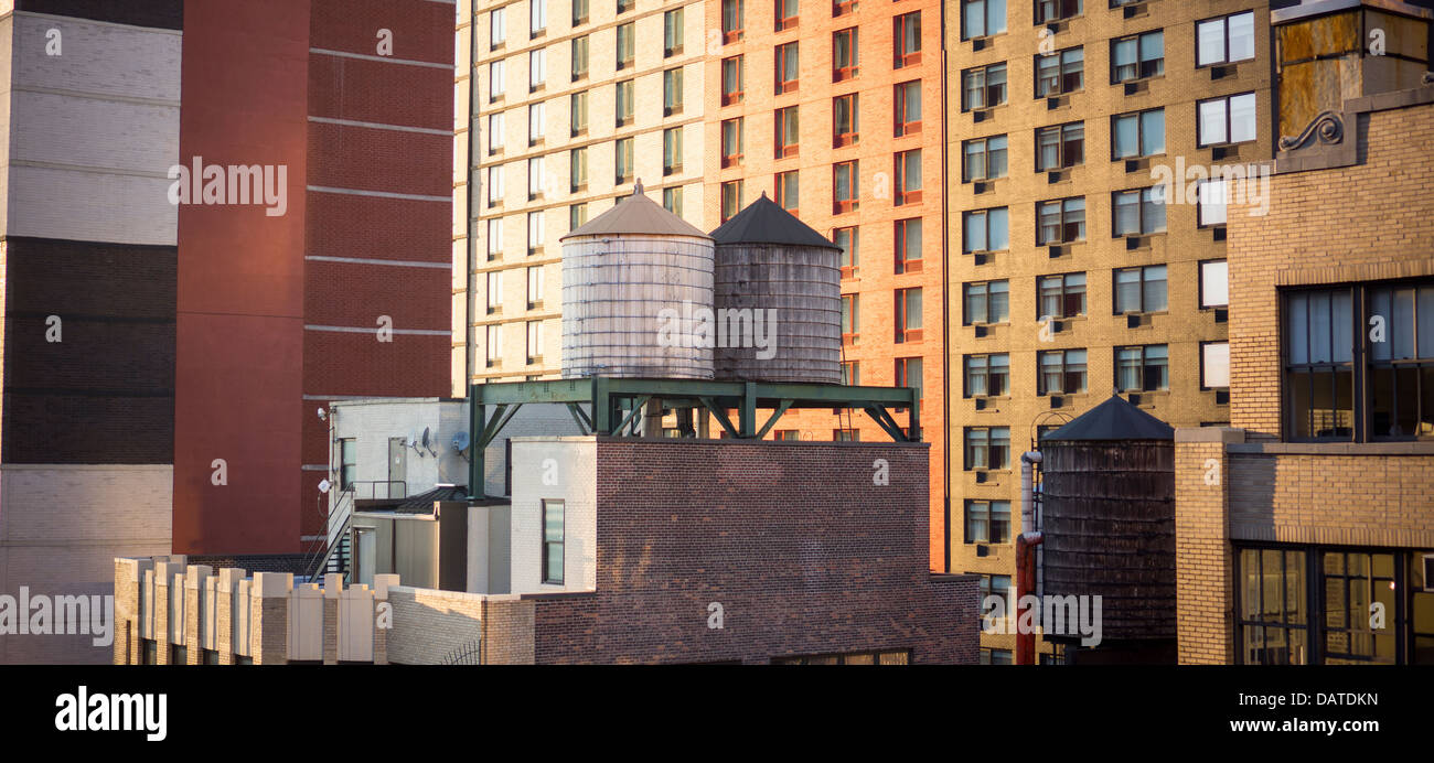 Water tanks on the rooftop of an office building in midtown Manhattan ...