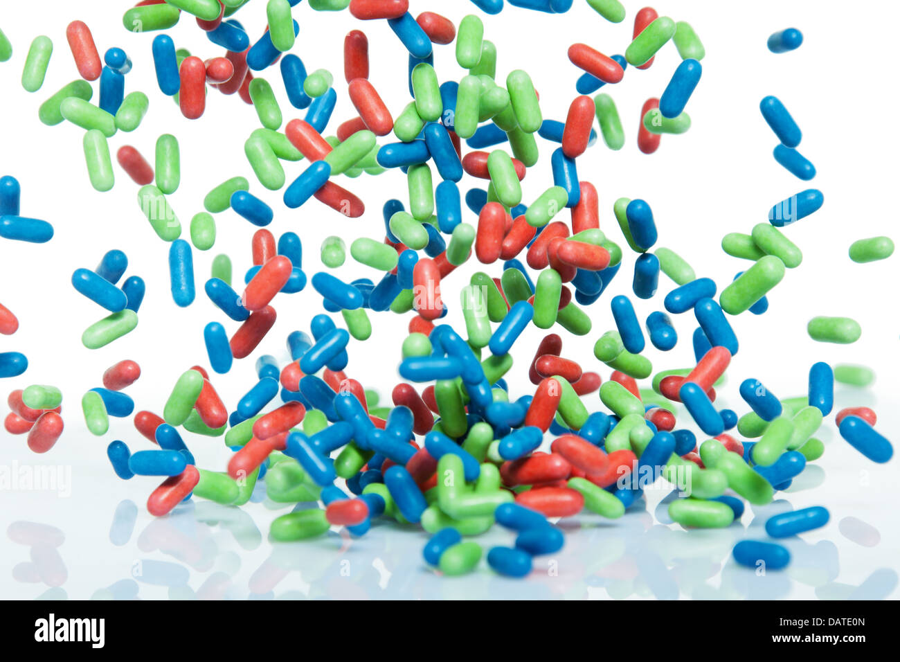 Closeup different medical pills falling hi-res stock photography and ...