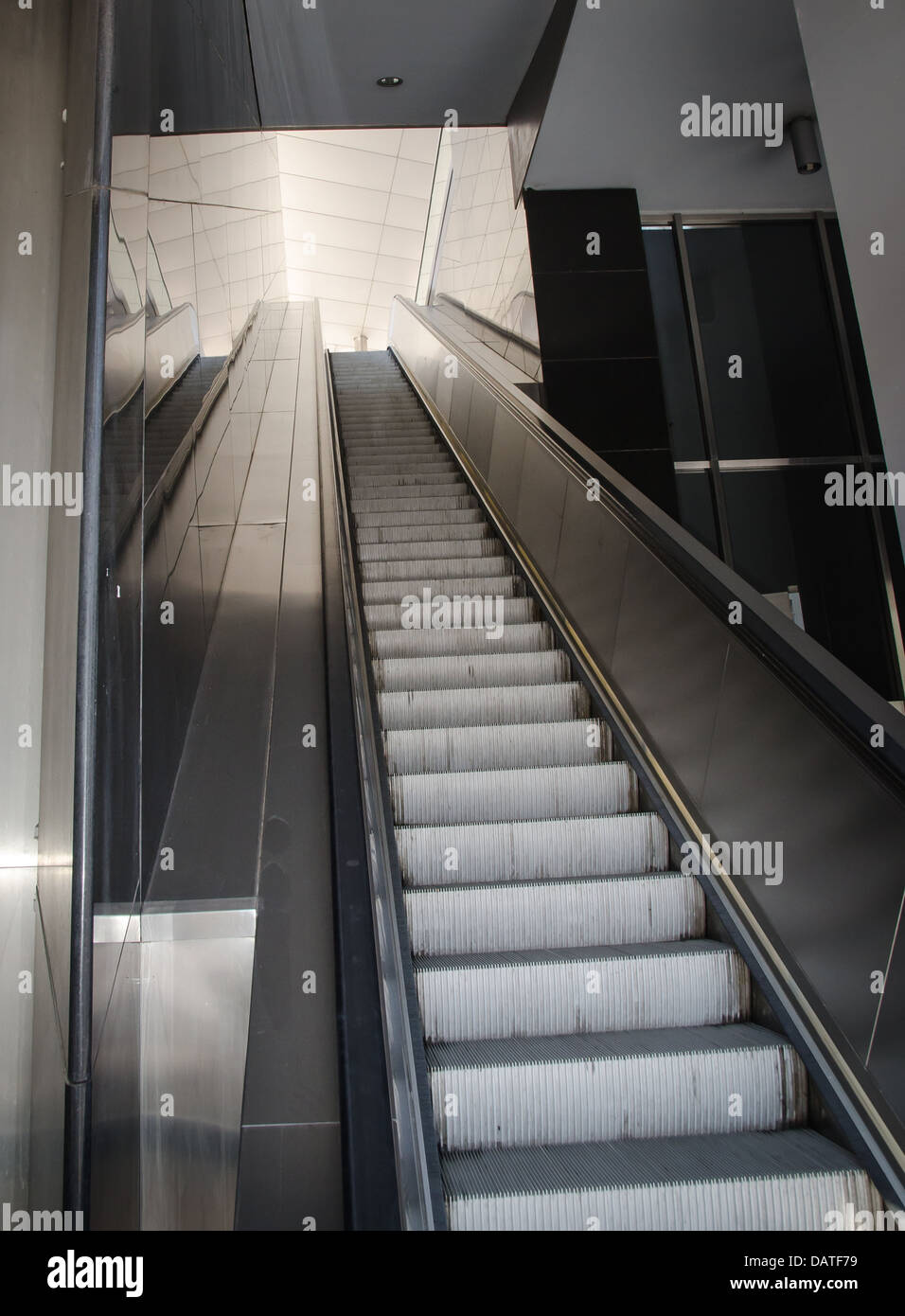 Long Moving Stairs On Airport Stock Photo - Alamy