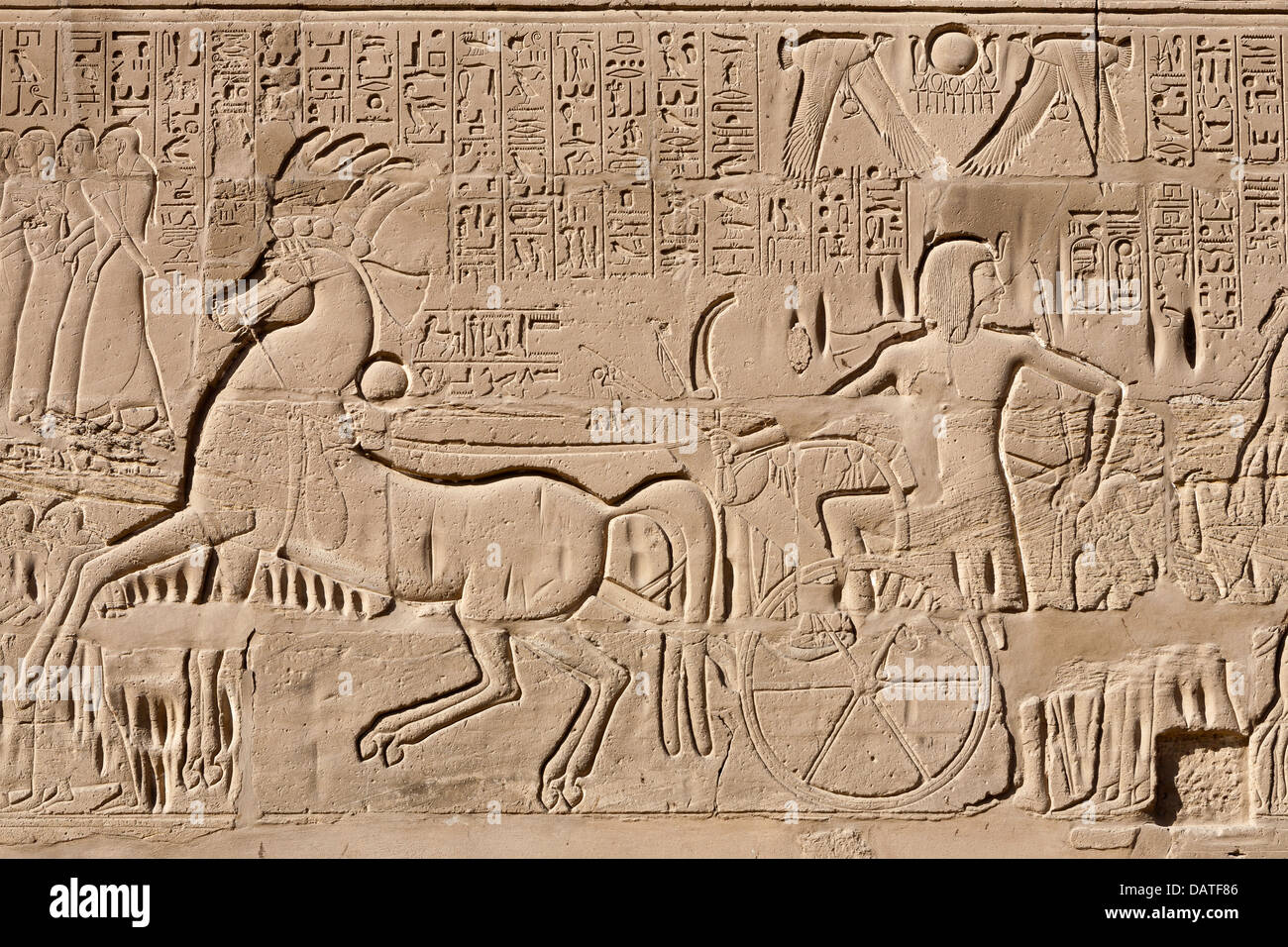 Pharaoh driving chariot scene at The Temple of Amun at Karnak, Luxor ...