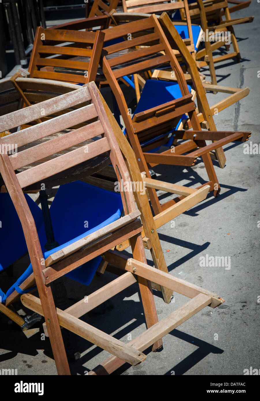 Tables And Chairs Of Closed Outdoor Restaurant Stock Photo - Alamy
