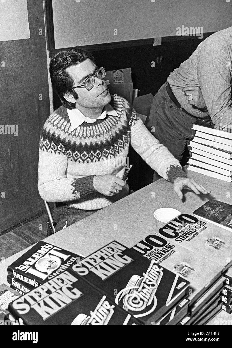 Novelist Stephen King signing his books at a book signing party in ...