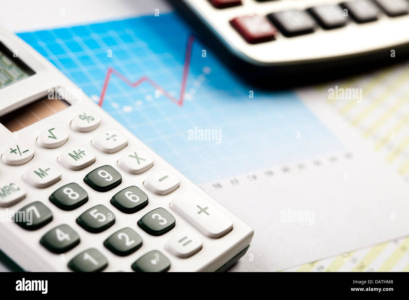 Diagram and calculator Stock Photo - Alamy