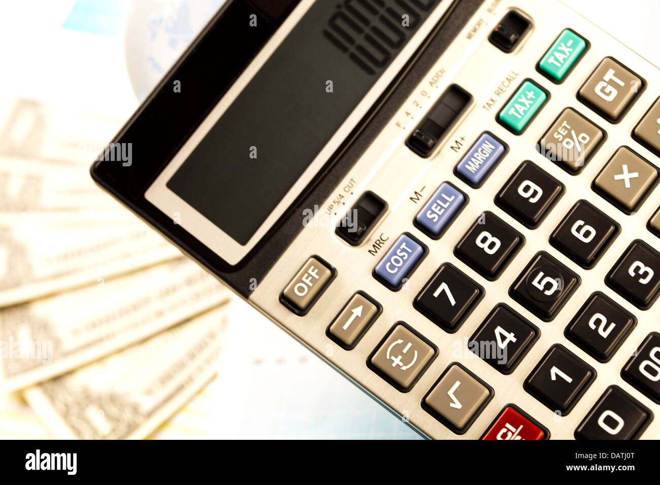Money and calculator Stock Photo - Alamy