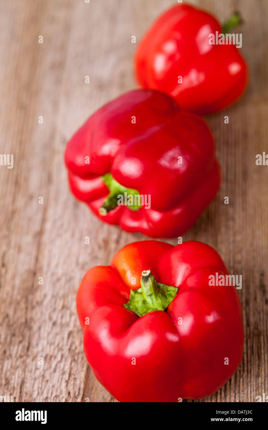 three red bell peppers Stock Photo - Alamy