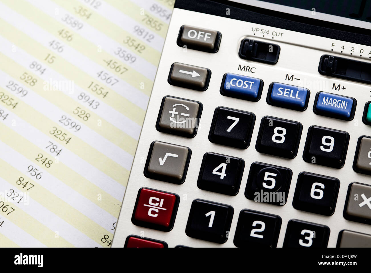 Calculator and Report Stock Photo - Alamy