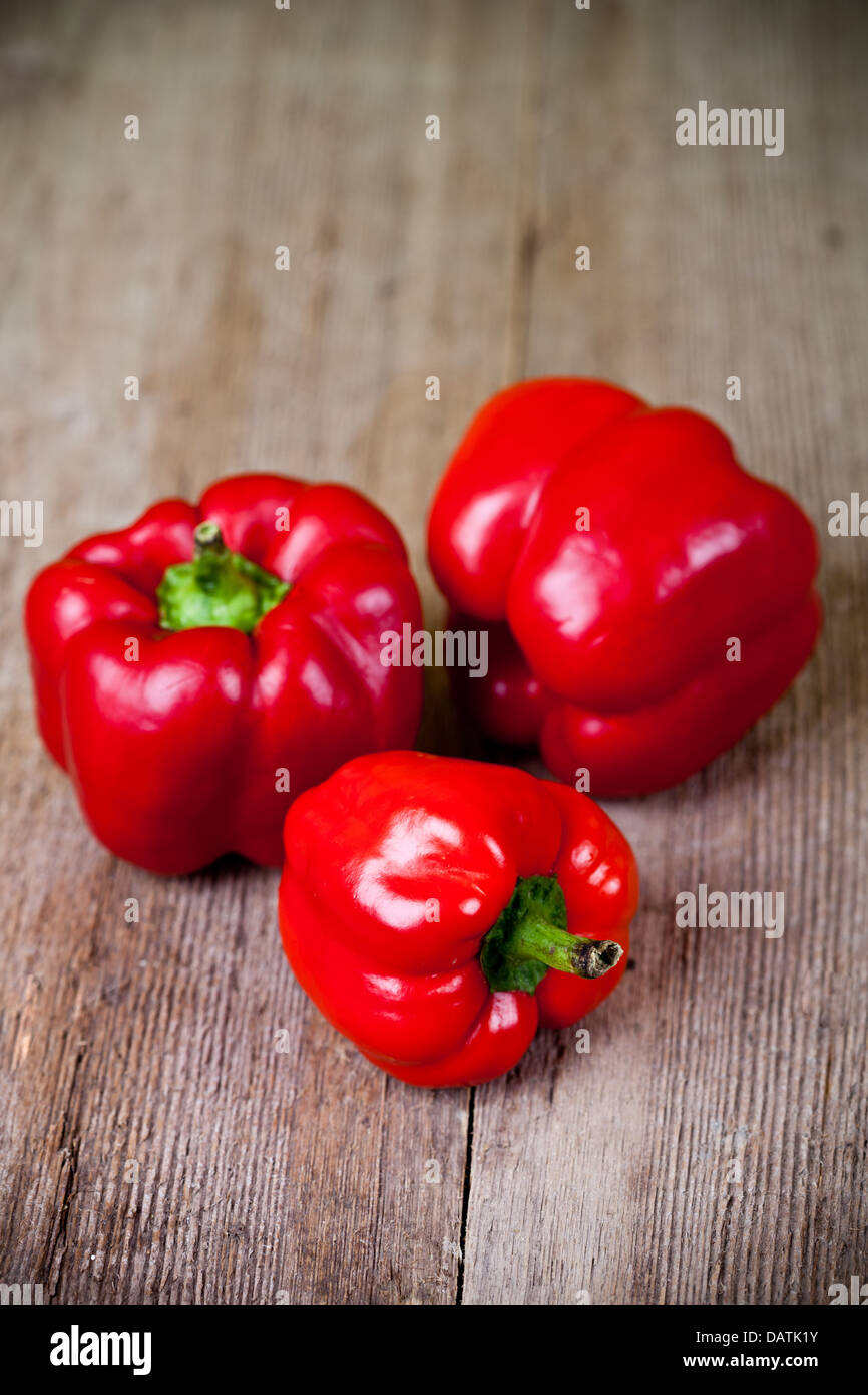 three red bell peppers Stock Photo - Alamy