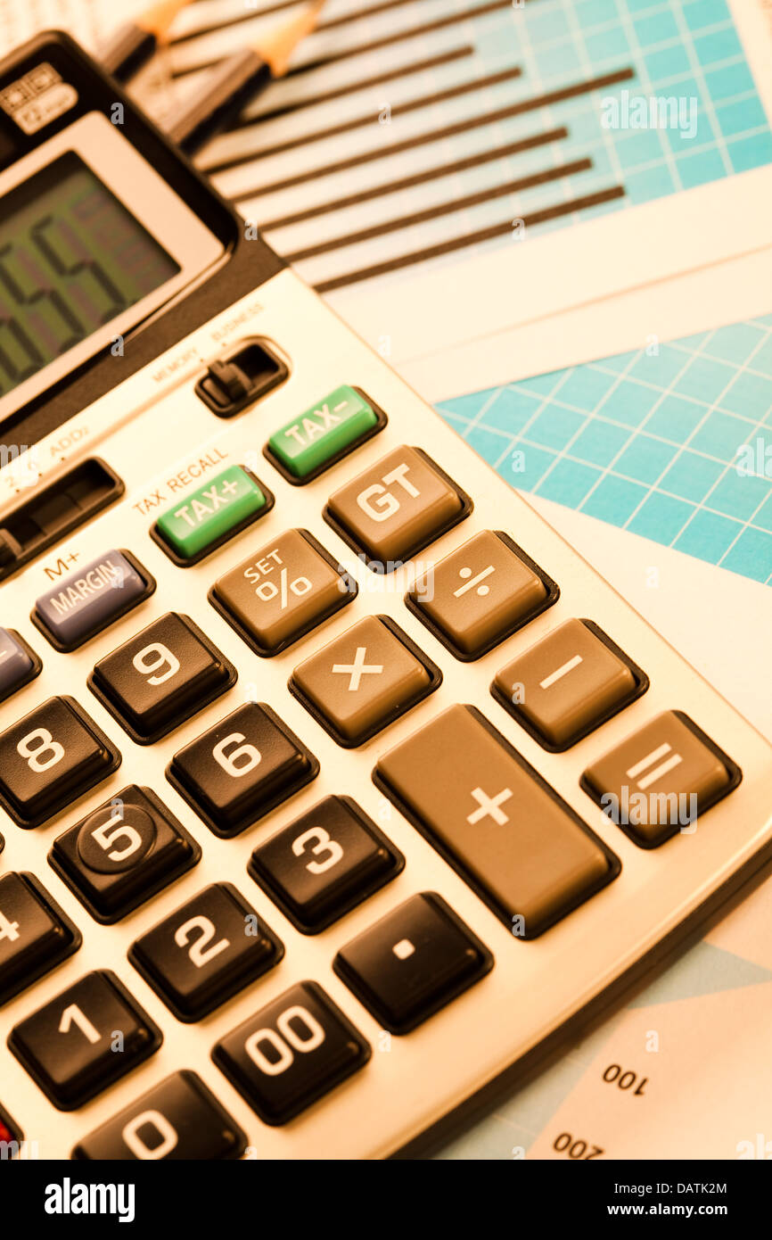 Diagram and calculator Stock Photo - Alamy