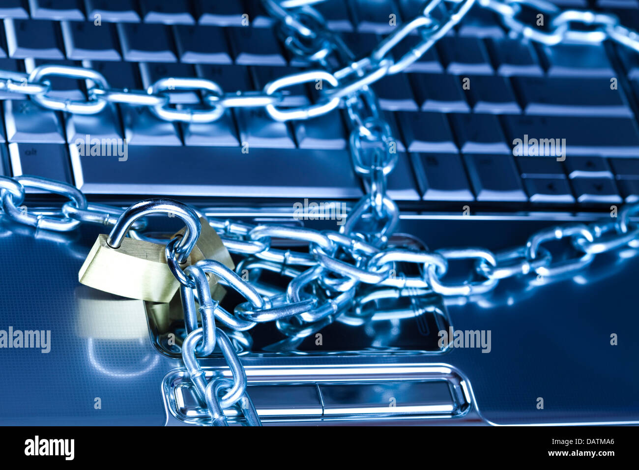 Padlock and notebook computer Stock Photo - Alamy