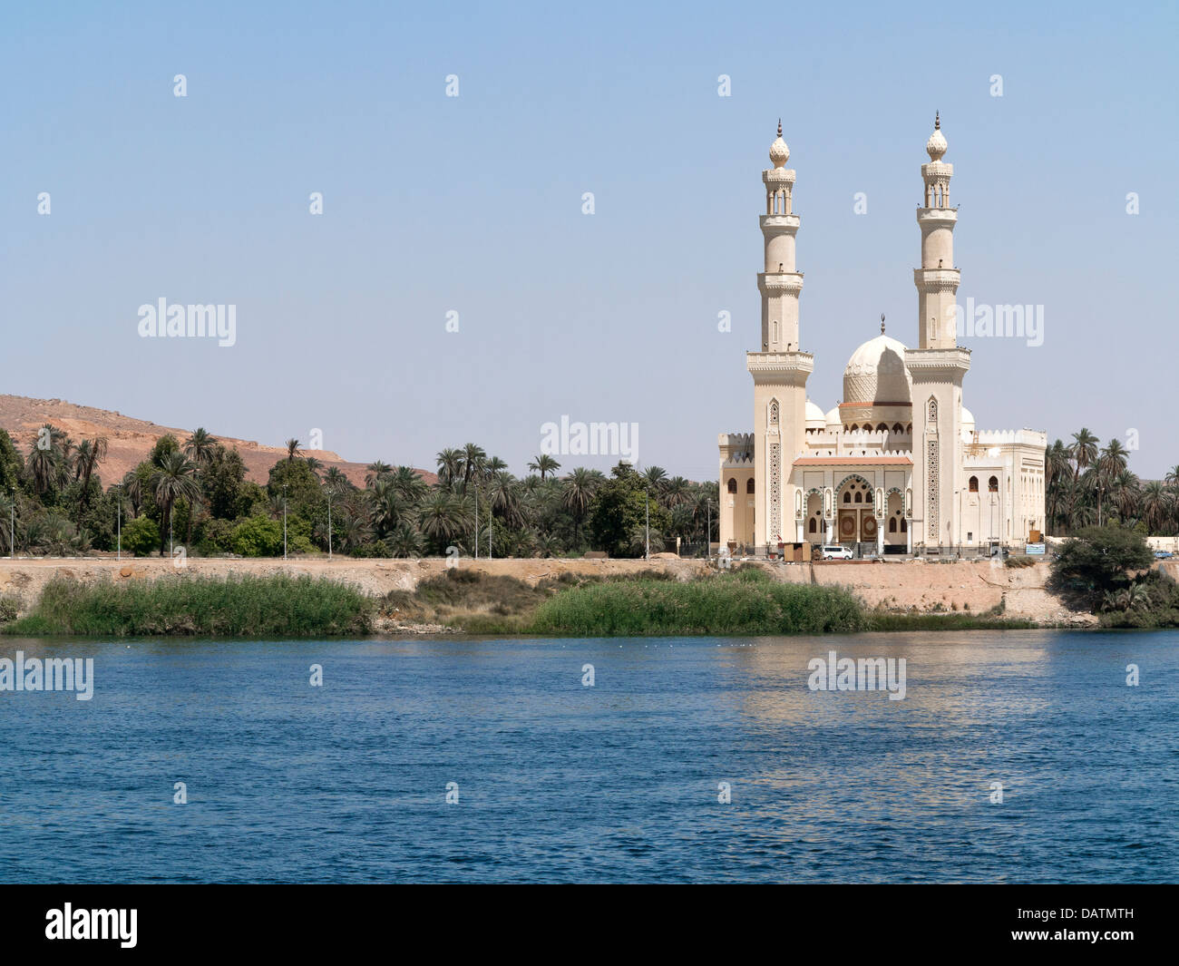 Mosque on the banks of the river Nile with broken reflection Stock ...