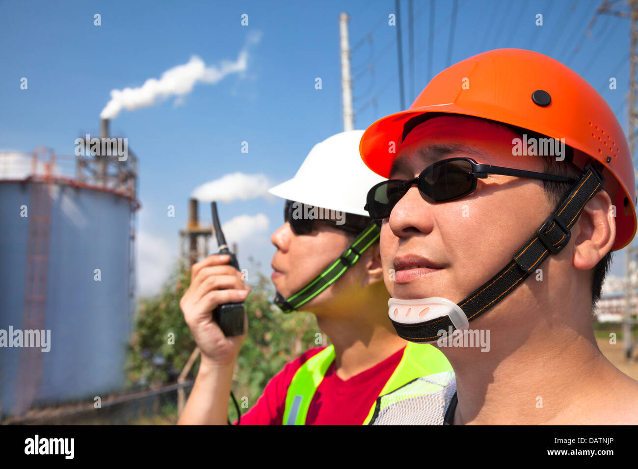 close up of two asian refinery workers Stock Photo - Alamy