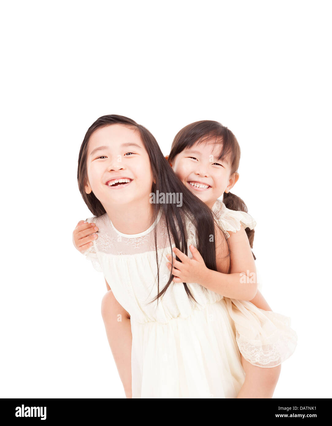 happy two little girls isolated on the white background Stock Photo - Alamy