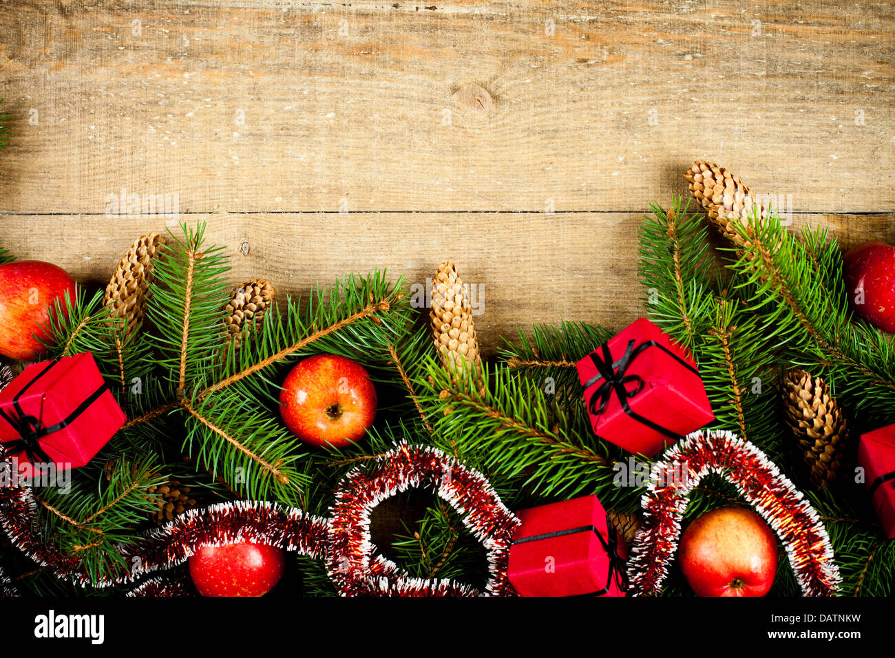 christmas fir tree with pinecones, apples and decorations Stock Photo ...