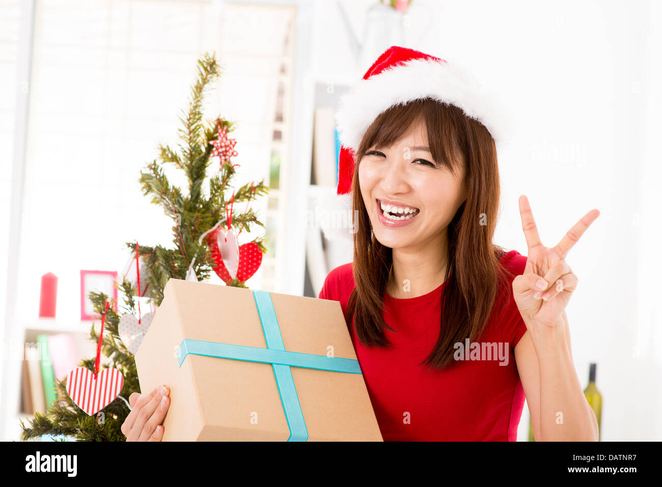 Cute asian christmas santa hi-res stock photography and images - Alamy