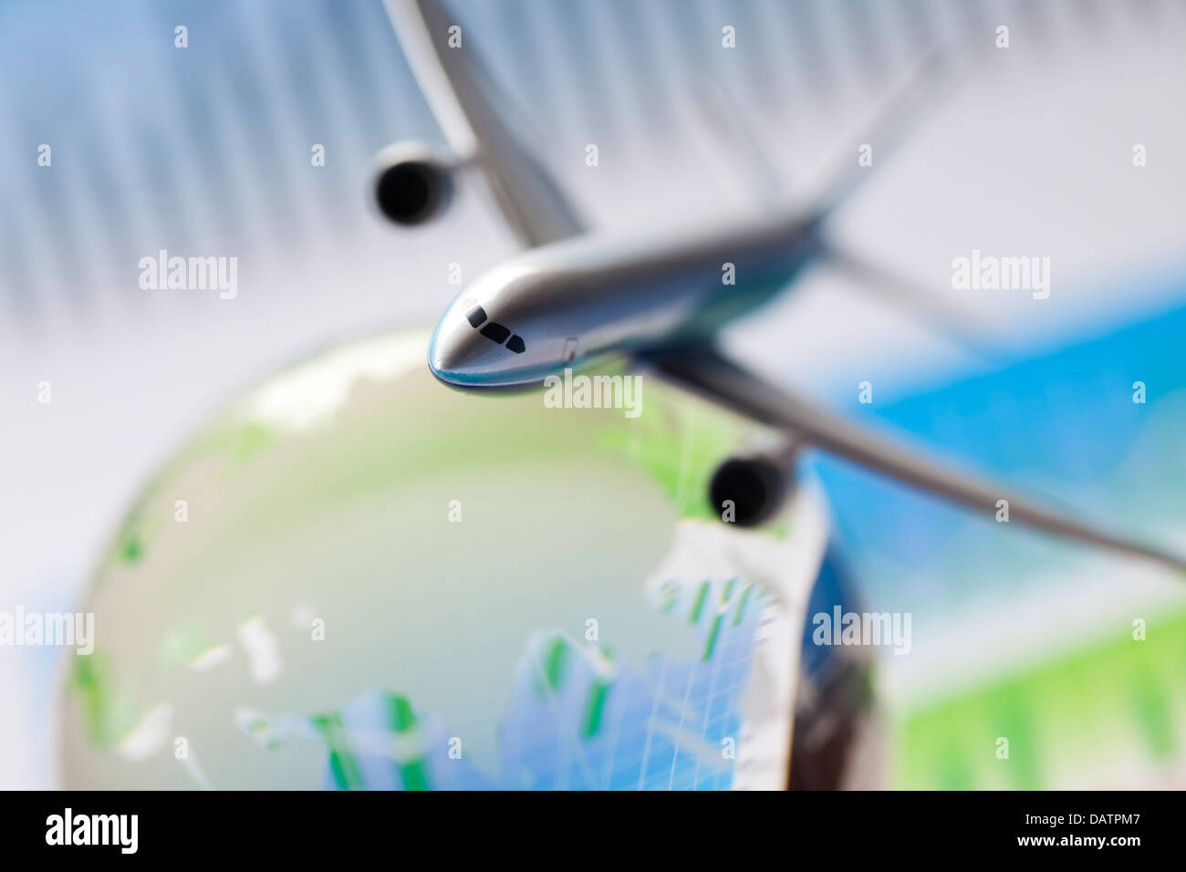 Airplane in finance and world Stock Photo - Alamy