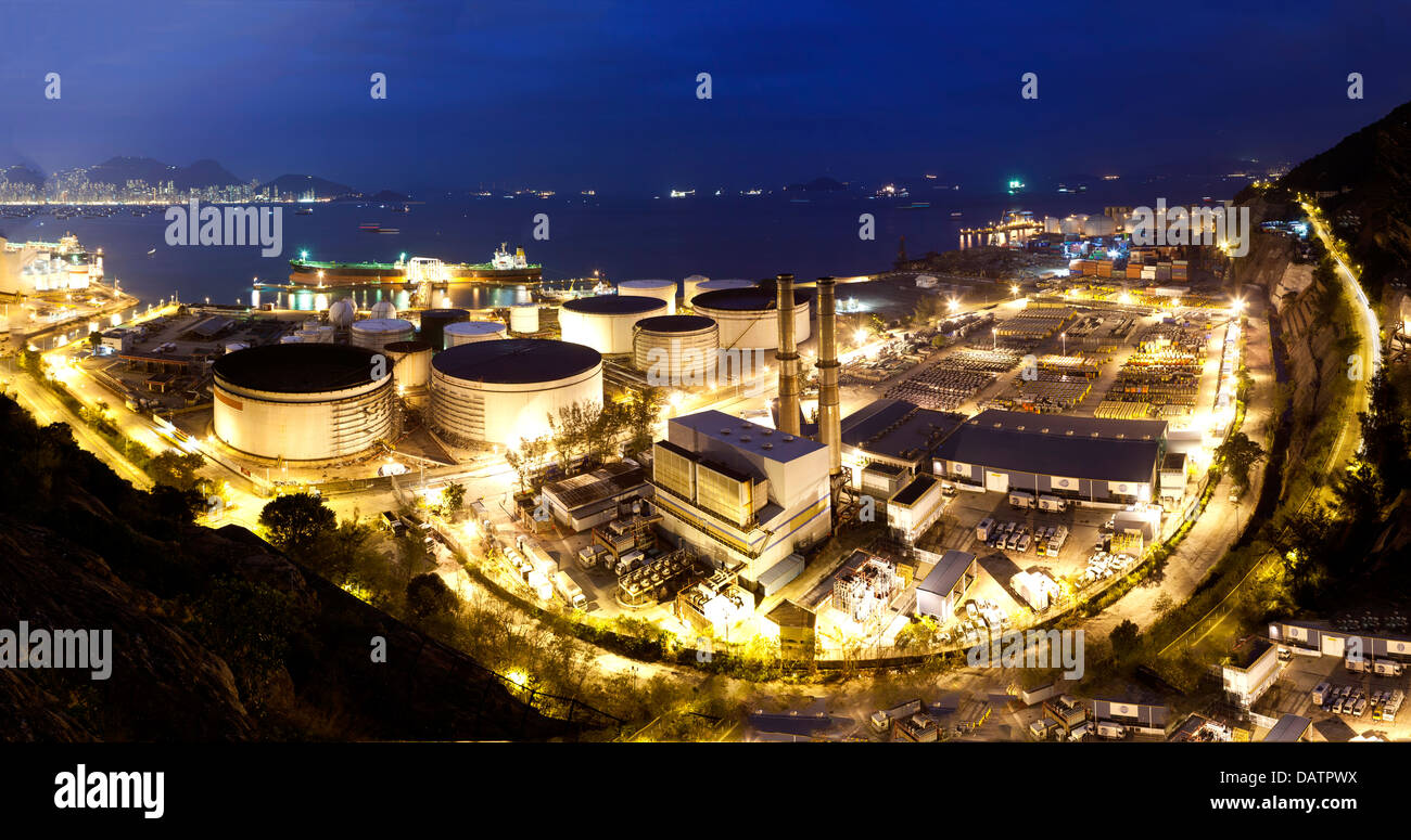 Oil tanks at night Stock Photo - Alamy