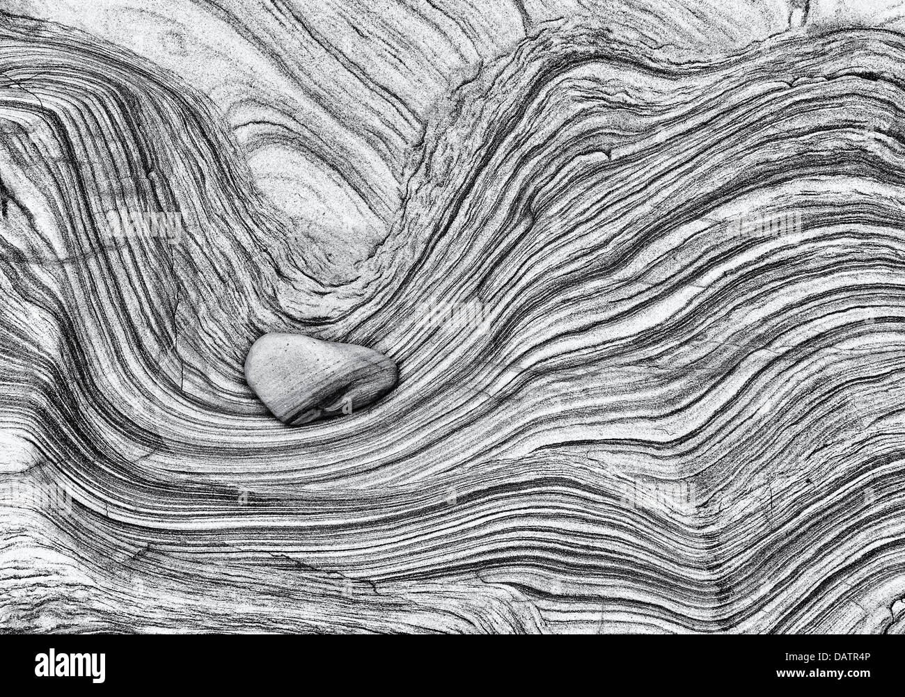 Sandstone rock strata and pebble pattern. Northumberland Coastline ...