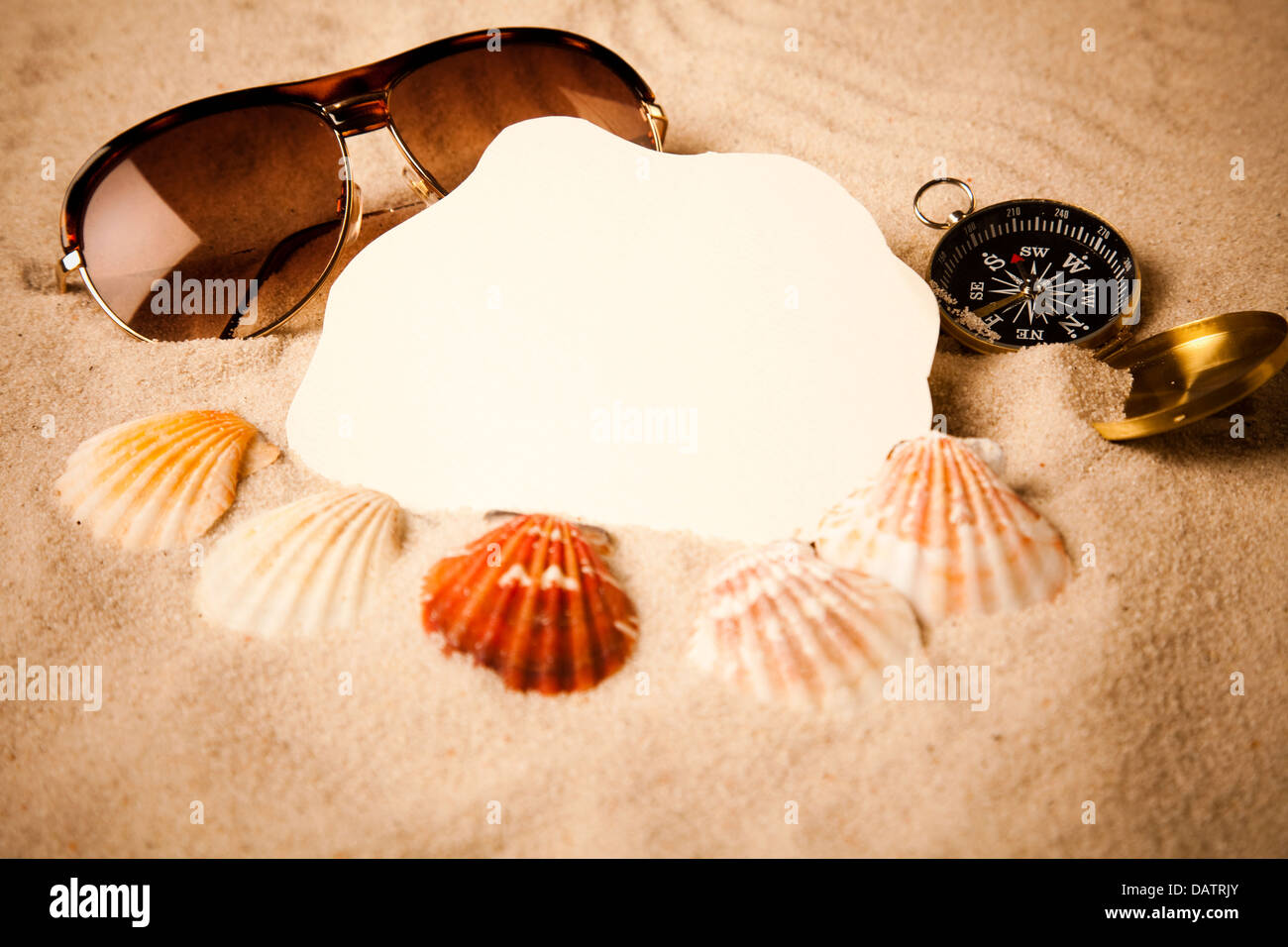 Sands, messages, shells and best from holidays Stock Photo - Alamy