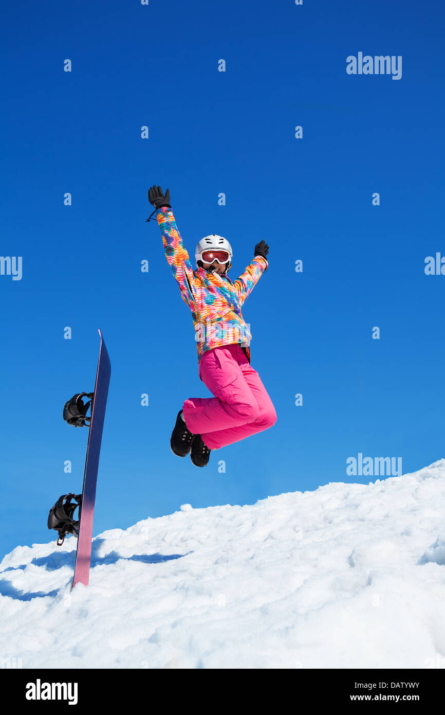Women jumping snow hi-res stock photography and images - Alamy