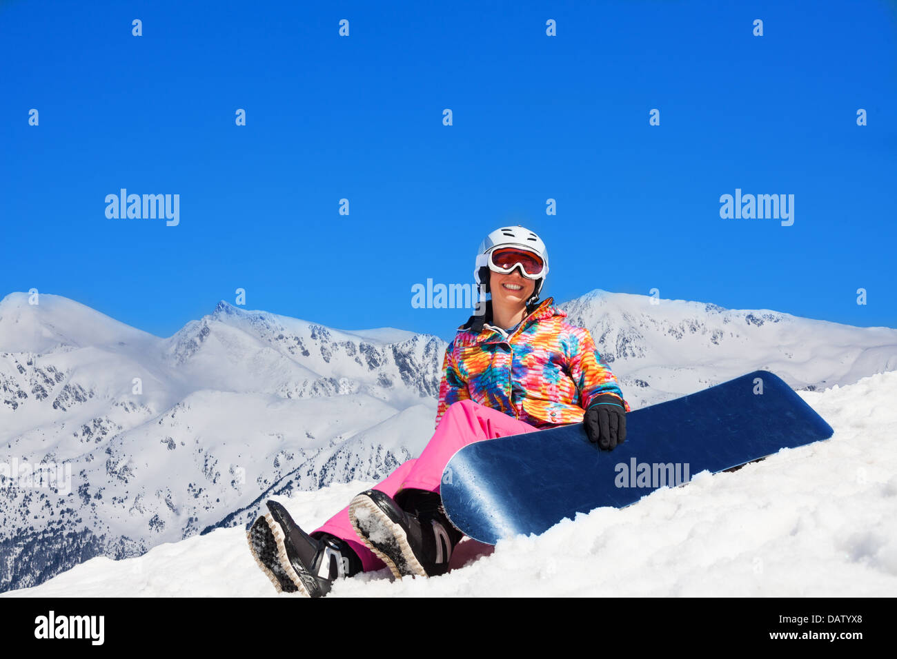 Snowboarding on snow mountains in hi-res stock photography and images ...
