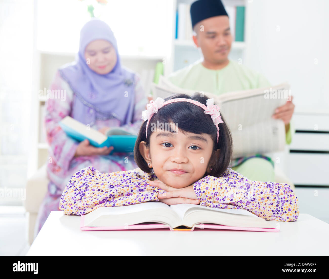 Asian girl reading Stock Photo - Alamy