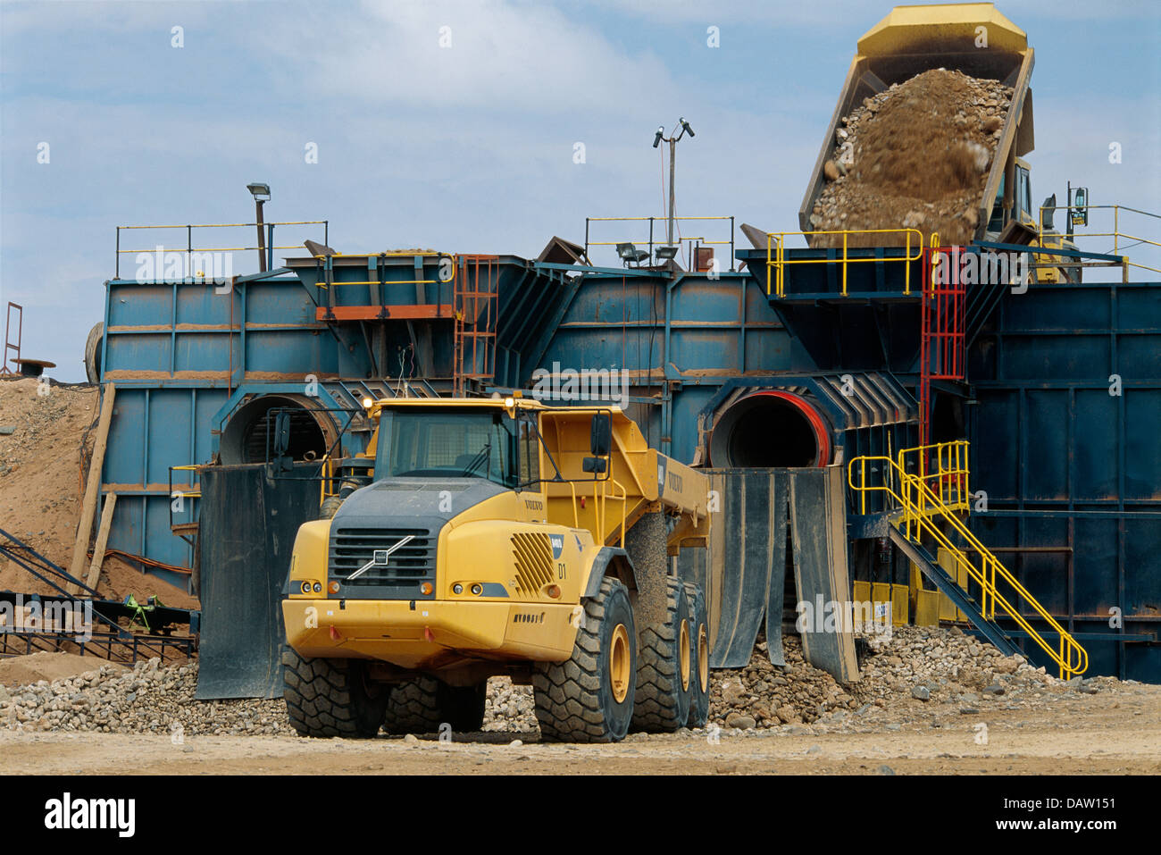 A diamond mine operation where the rough alluvial rocks are sifted near ...