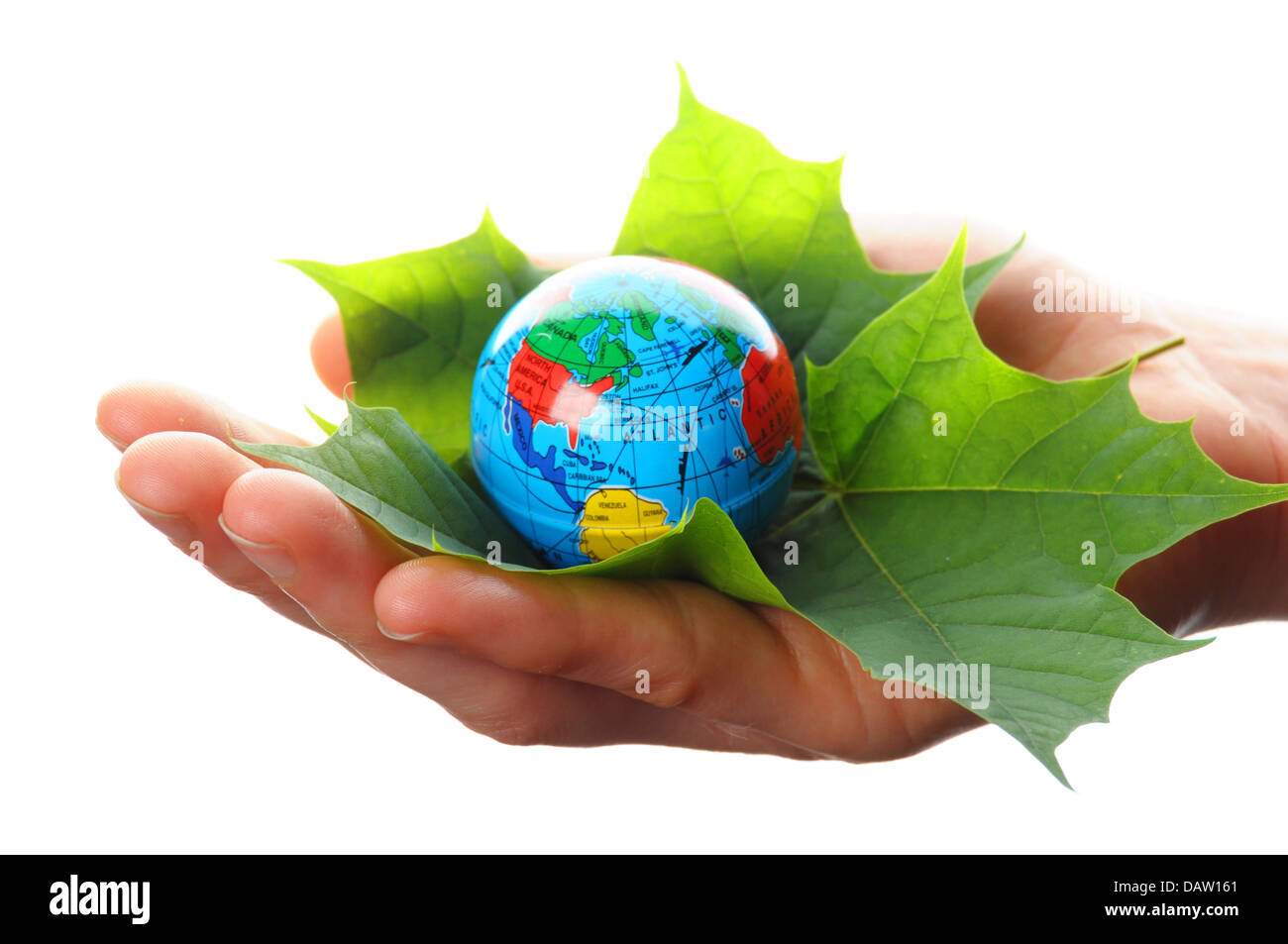 globe in hand Stock Photo - Alamy