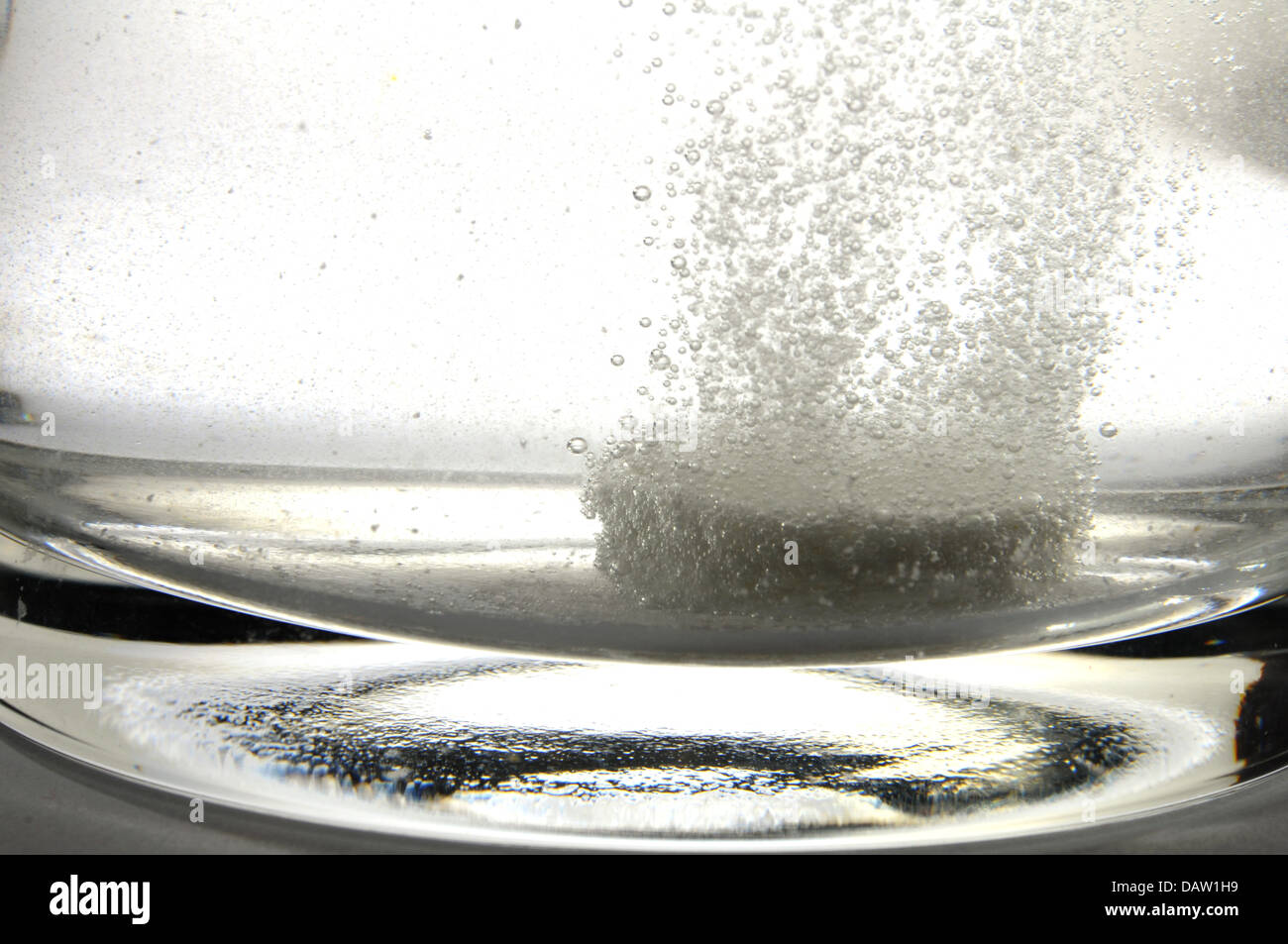 tablet in water Stock Photo - Alamy