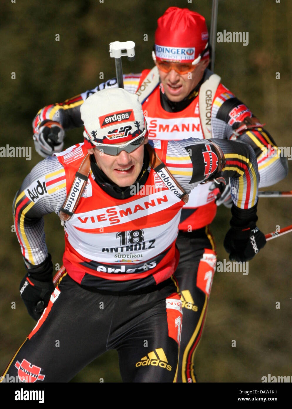Michael Roesch and Andreas Birnbacher (R) are pictured on their way to ...