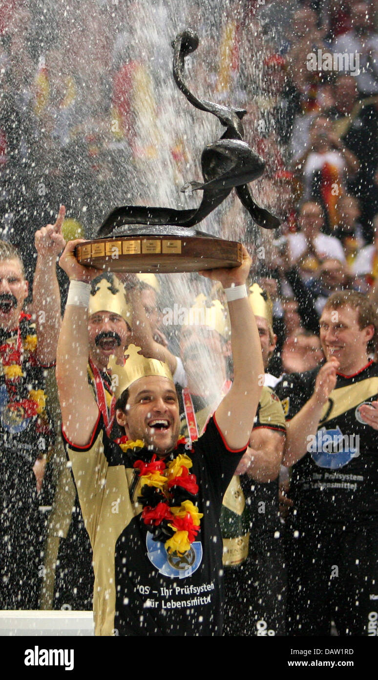 German national handball team player Markus Baur lifts the winner's ...