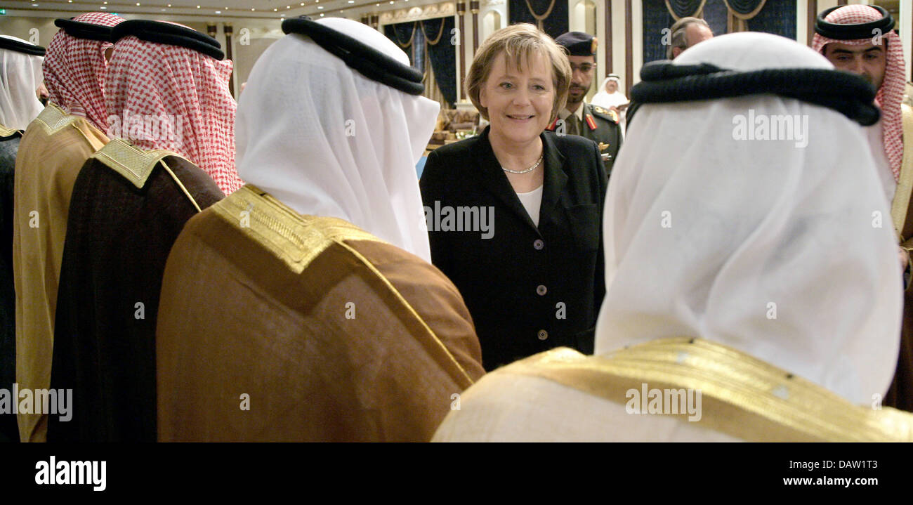 German Chancellor Angela Merkel (L) meets members of government in Abu ... German Chancellor Angela Merkel (L) meets members of government in Abu ...