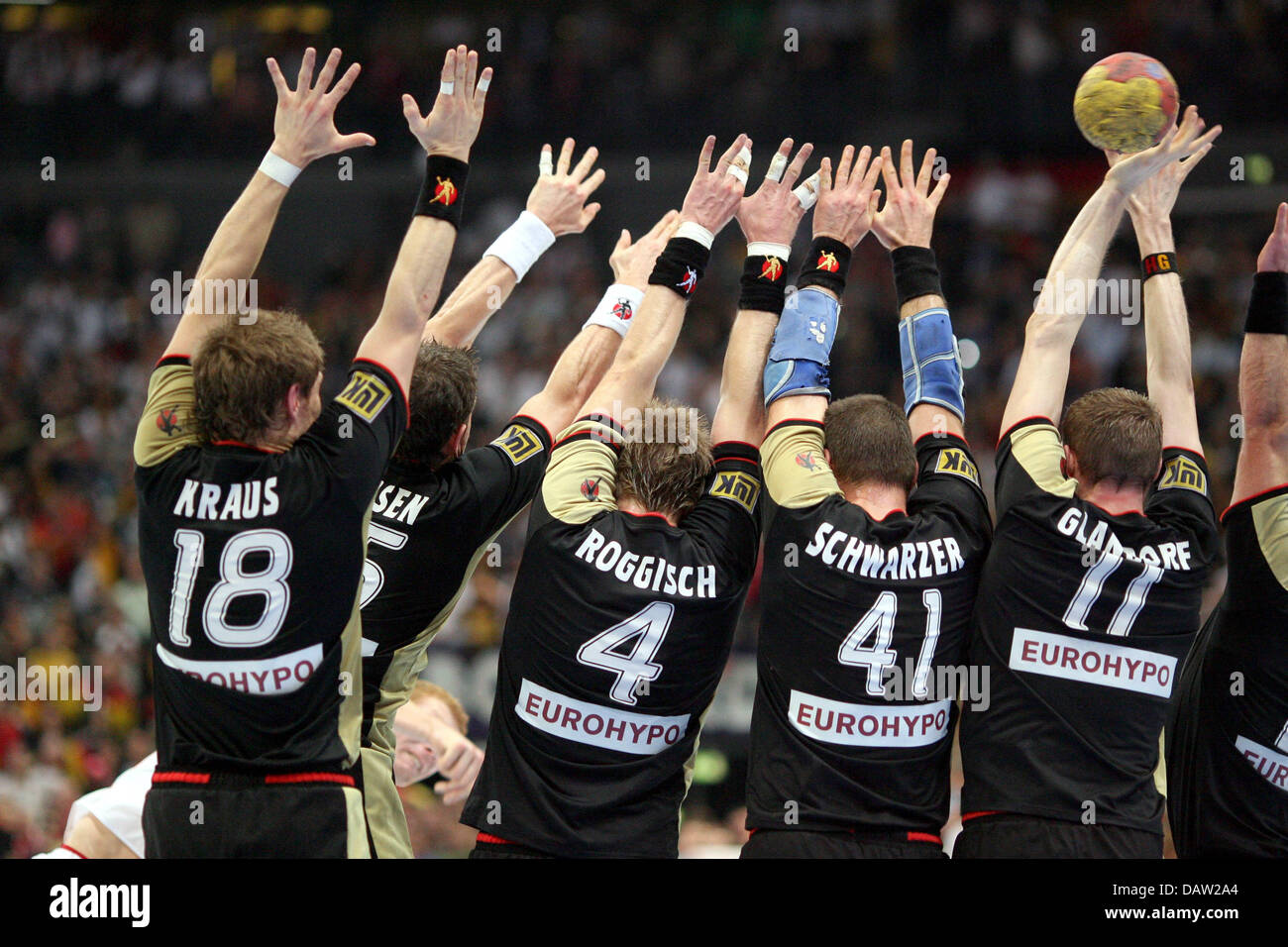 The German defense blocks a free throw during the 2007 Germany Handball ...
