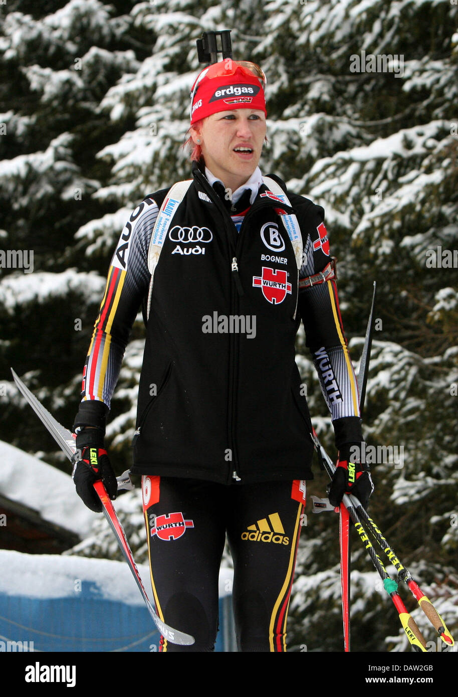 German Kati Wilhelm walks back to the start after giving up in the ...