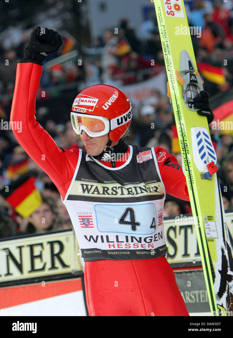 German ski jumper Michael Uhrmann cheers his fabulous jump at the team ...