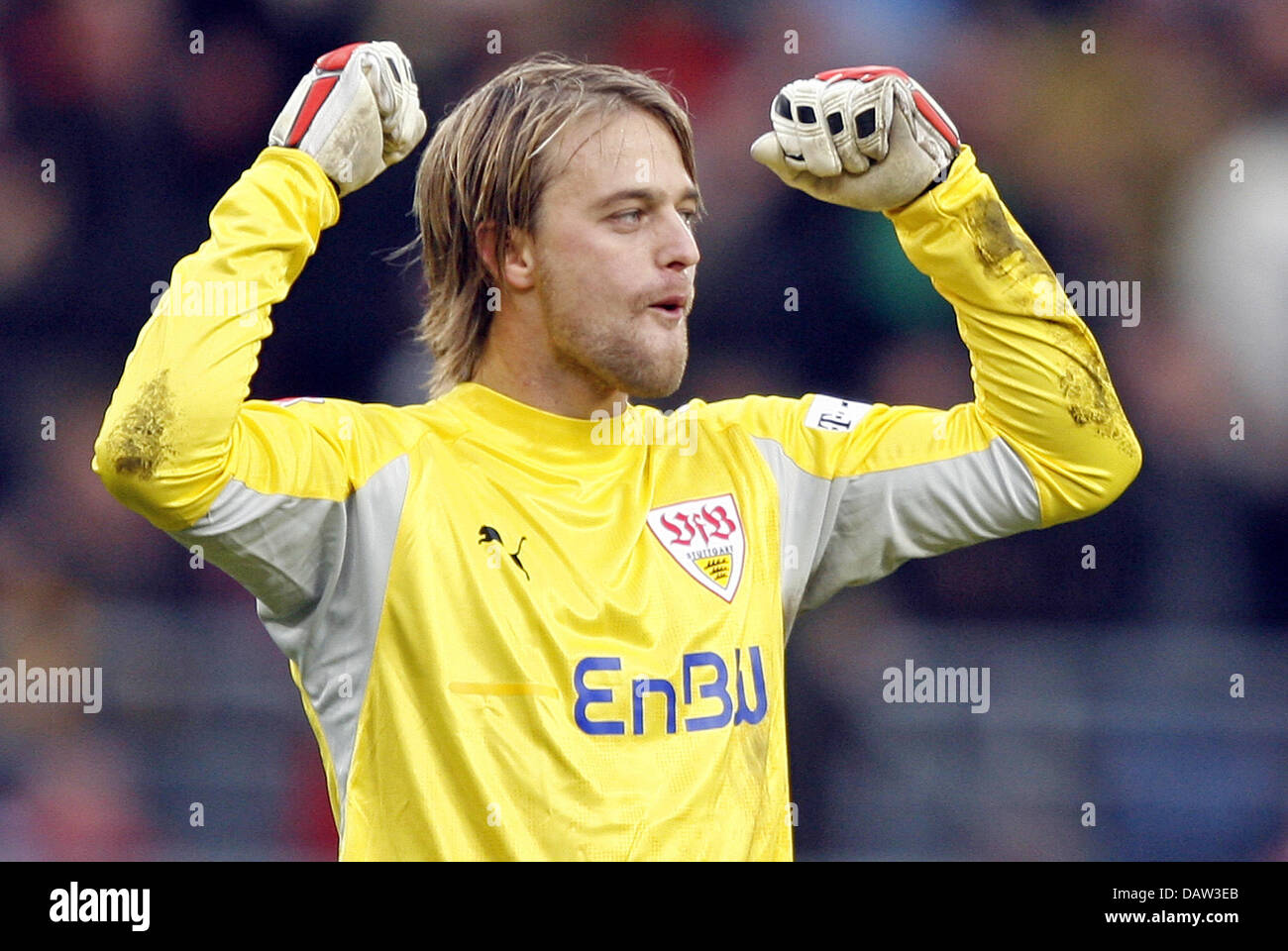 Stuttgart's goalkeeper Timo Hildebrand celebrates with his arms raised ...