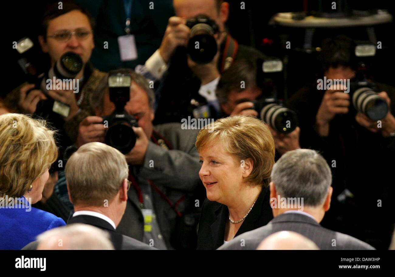 German Chancellor Merkel greets diplomats at the beginning of the 43rd ...