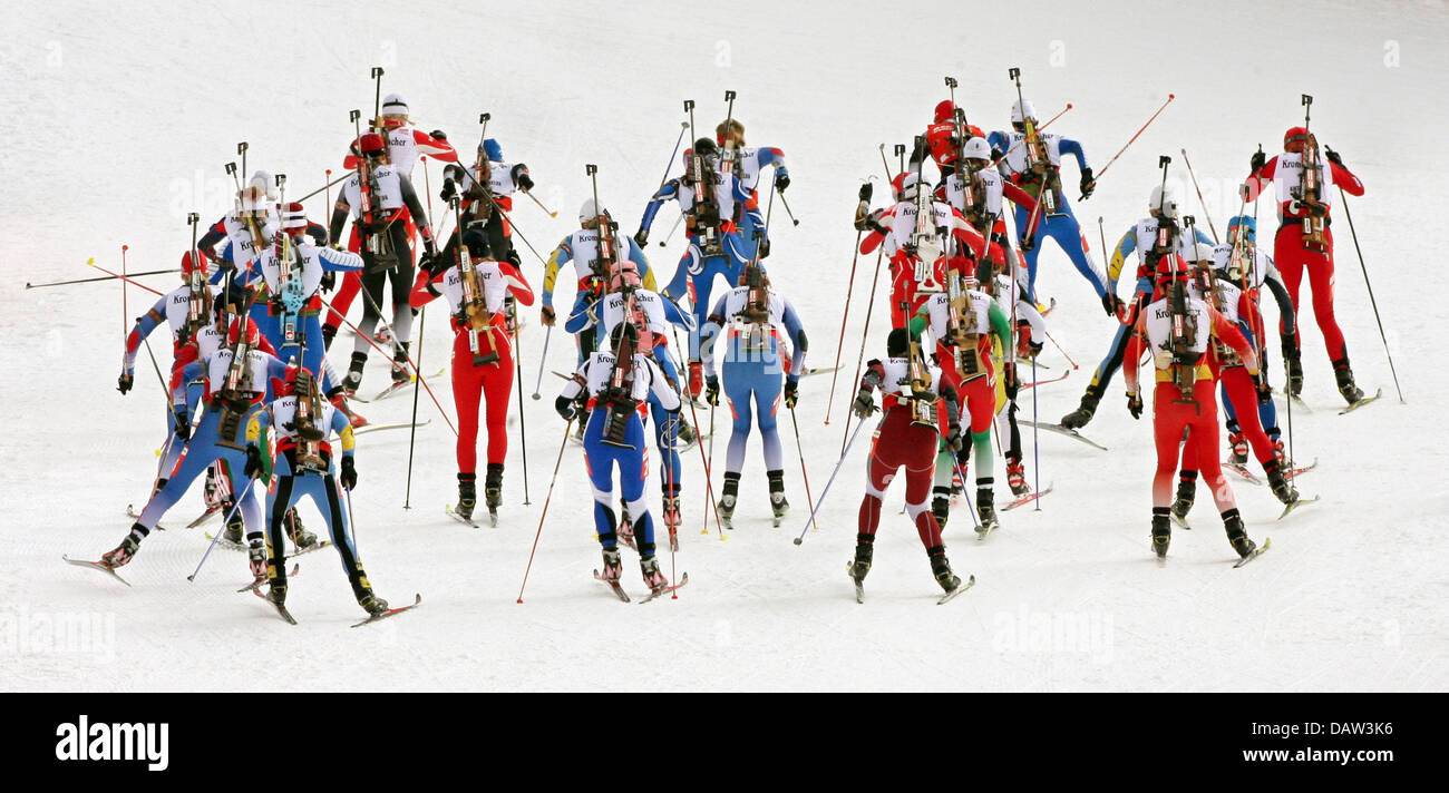 Biathletes start to the 12.5 km mass start Women of the Biathlon World ...