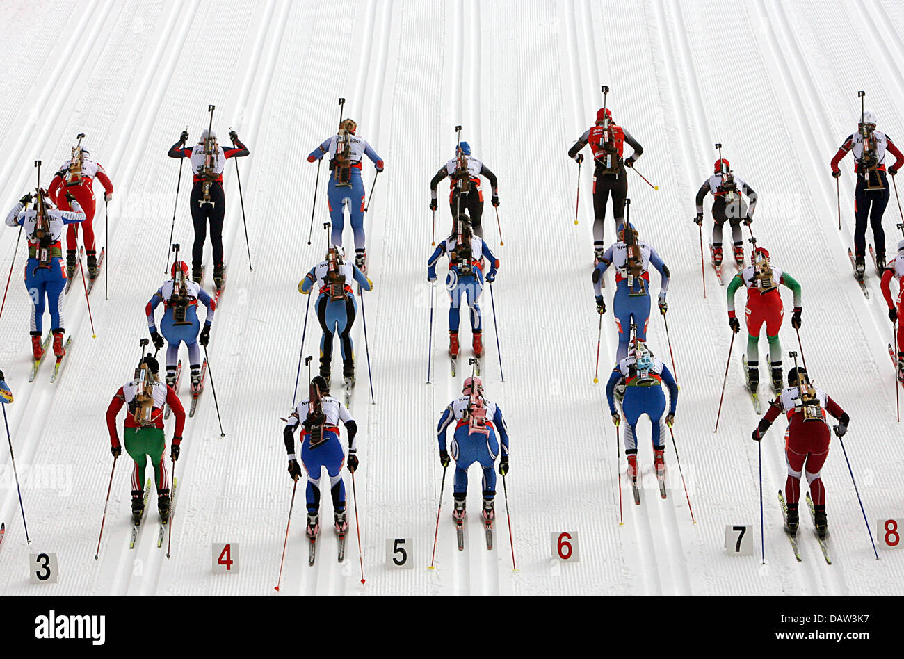 Biathletes start to the 12.5 km mass start Women of the Biathlon World ...