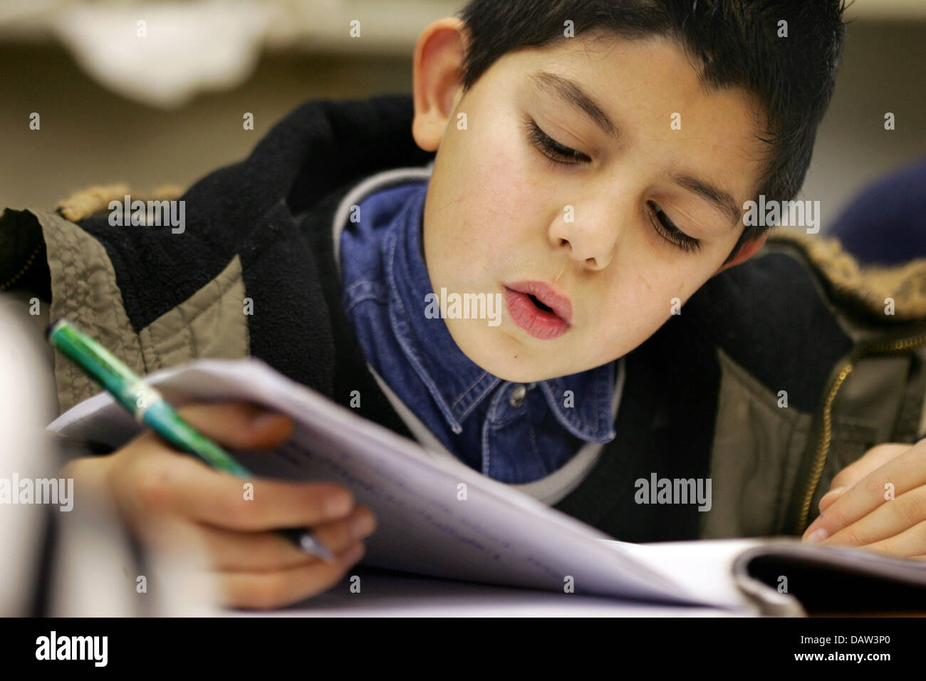 A fifth grade muslim pupil takes part in an islamic religion course at ...